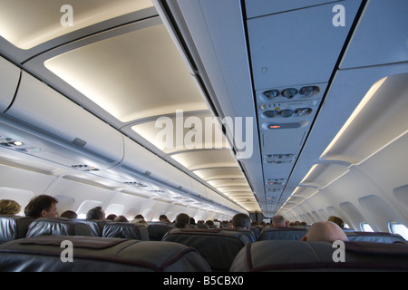 Overheads for cabin baggage stowage in aircraft Stock Photo - Alamy