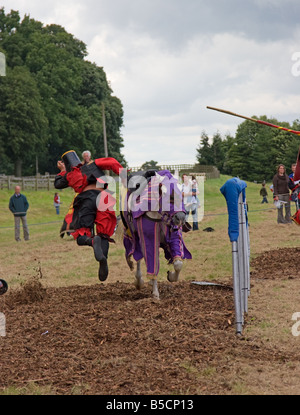 Knight falling off horse at a joust Stock Photo - Alamy