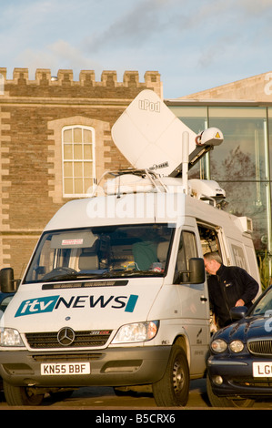 Television (TV) outside broadcast (OB) vans outside Royal Courts of ...
