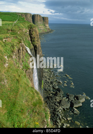 Waterfall over cliff into the sea The Kilt Rock Isle of Skye Scotland ...
