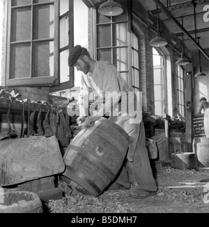 Coopers making beer barrels at the Whitbread brewery. October 1958 ...