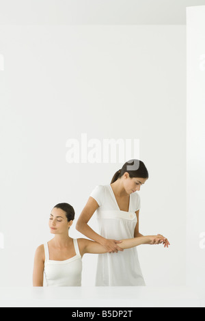 Woman receiving arm massage at beauty salon Stock Photo - Alamy