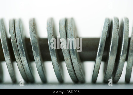 Selective focus shot of a metal screw nut with red and green lights ...