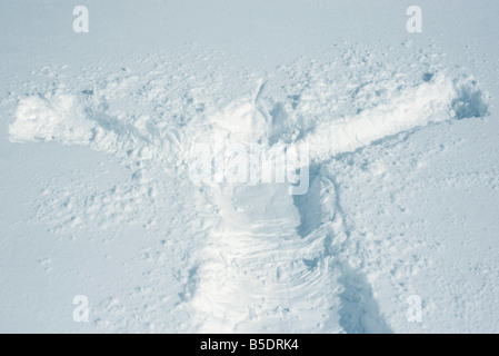 Overhead view of a snow angel shape Stock Photo - Alamy