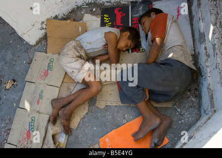 Homeless Boys Sleeping Outside in Alexandria Egypt Stock Photo - Alamy