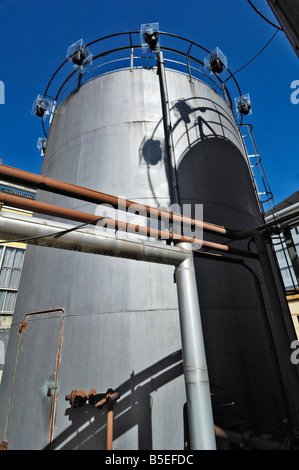 Industrial plant, silo, piping system Stock Photo - Alamy