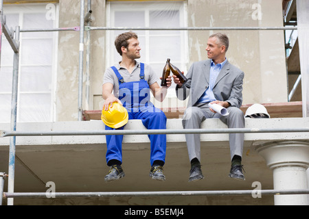 construction worker drinking beer Stock Photo - Alamy
