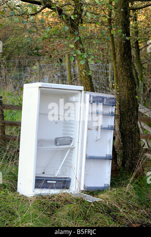 Fly tipped fridge freezer dumped on a moorland in North Wales. The ...