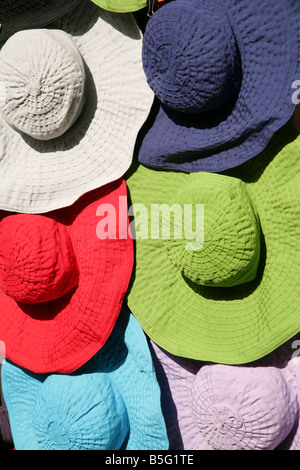 Different Colors of Hats on a White Background Stock Photo - Alamy