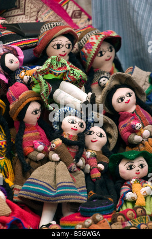 Peruvian traditional craft handmade dolls and textile. Colorful clothes ...