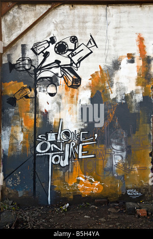 Grafiti on factory wall Stock Photo - Alamy