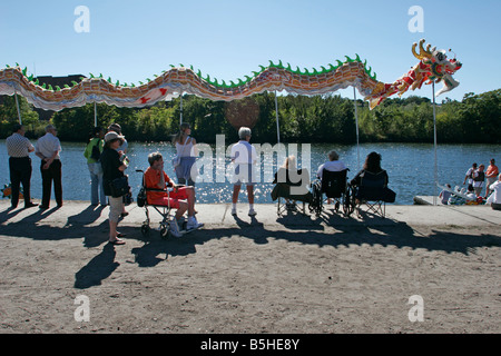 People watching a dragon boat race in Aberdeen Promenade at Dragon Boat ...