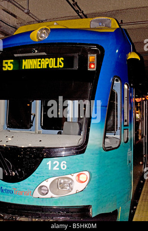St. Paul, Minnesota. Hybrid electric metro transit bus weaving its way ...