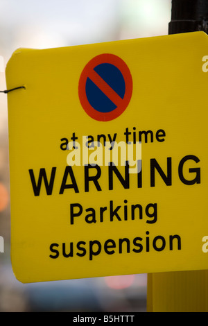 Parking suspension warning Stock Photo - Alamy