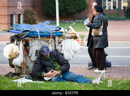 Poor homeless tramp Stock Photo - Alamy