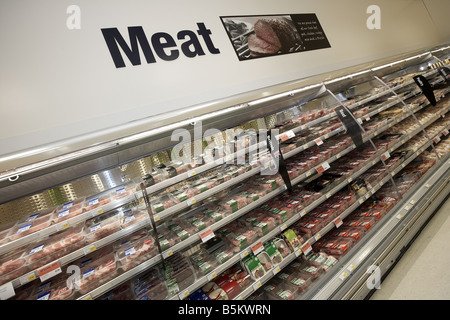 Meat stacked on supermarket shelves Supermarket interior Stock Photo ...