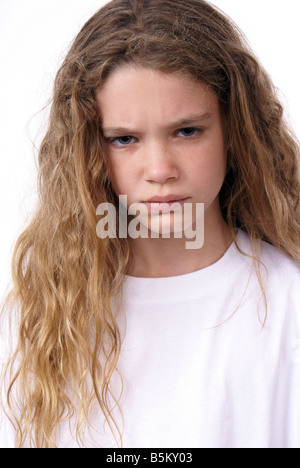 Girl child kid with a disappointed look on her face or sad face ...