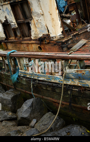 Abandoned in shore fishing boat at Corpach on the beach of Loch Linnhe ...