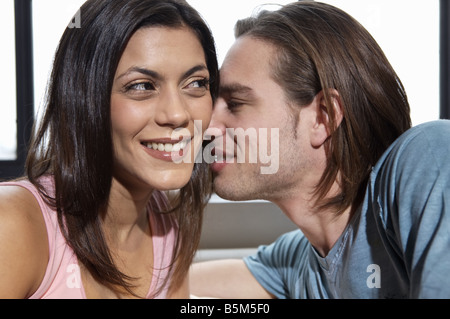 Couple caressing one another Stock Photo - Alamy