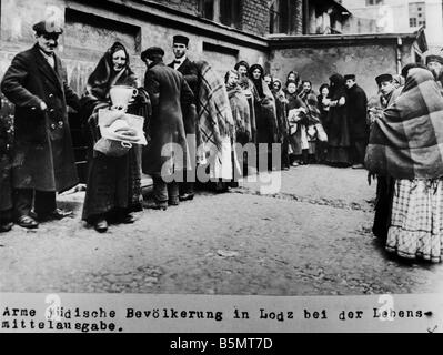 Homeless people waiting for food in front of the general post office ...