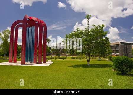 BELMOPAN BELIZE Sculpture with government buildings at rear in the ...