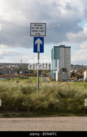 road signpost pointing towards council tax Stock Photo - Alamy