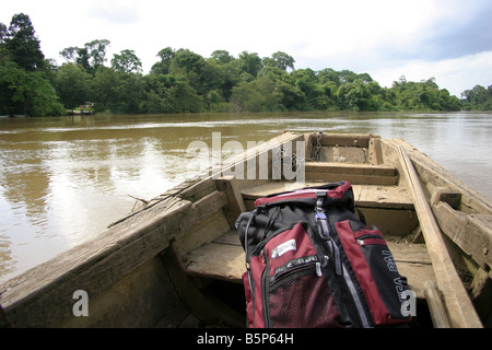 into a rowboat, the dai nai river at monsoon time in the nam cat tien ...