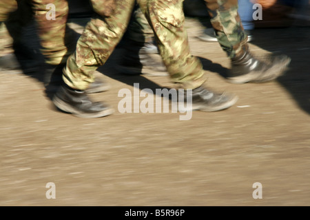 many soldiers feet marching on battlefield Stock Photo - Alamy