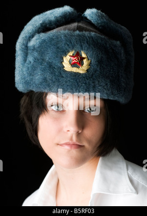 Beautiful girl with a Soviet Union hat isolated on the white Stock ...