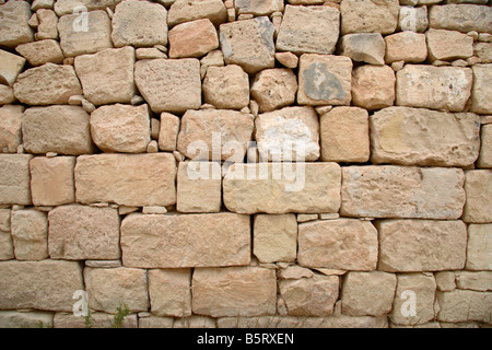 A Limestone, drystone wall in "St Thomas Bay", Malta Stock Photo - Alamy