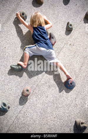 boy climbing rock barefoot Stock Photo - Alamy