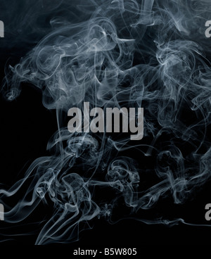 Smoke against black background Stock Photo - Alamy