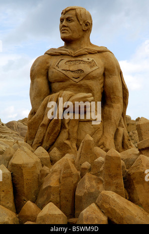 superman sand sculptures Stock Photo - Alamy