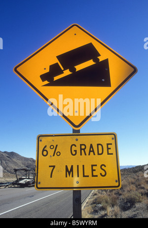 Downgrade warning sign on highway shows 6% grade Stock Photo - Alamy