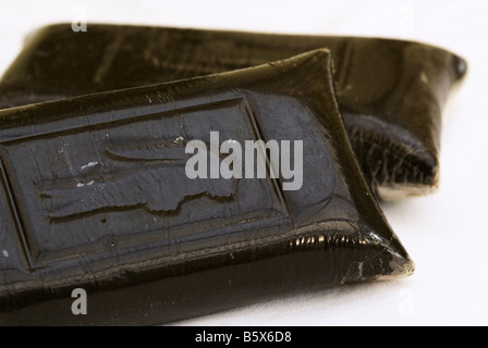 Nine-ounce bar of cannabis resin Stock Photo - Alamy