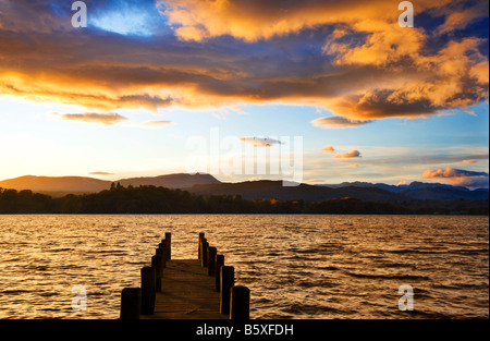 Sunset over Windermere with jetty in foreground, The Lake District ...