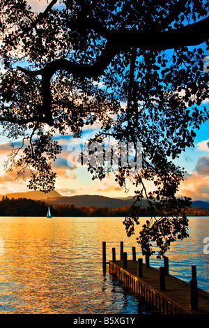 Sunset over Windermere with jetty in foreground, The Lake District ...