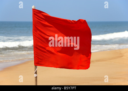 Red Danger Flag at Candolim Beach, Goa, India Stock Photo - Alamy
