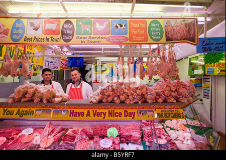Butcher in Shepherds Bush market selling halal meat, West London W12 ...