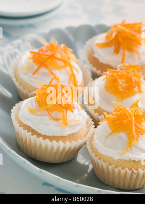 Iced Lemon Sponge Cakes Stock Photo - Alamy