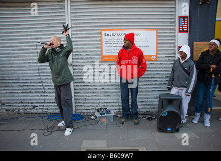 A street rapping young Christian Preacher man on the streets of Dalston ...