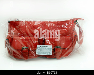 A warning label on a plastic bag Stock Photo - Alamy
