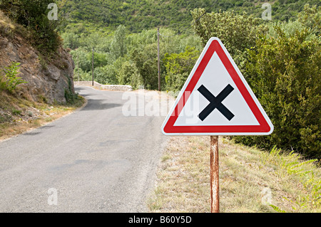 A French road sign warning that you do not have priority at a ...