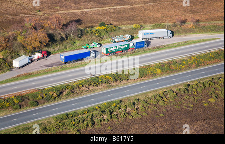 Transport trucks or lorries parked up in a line at an Express Food ...