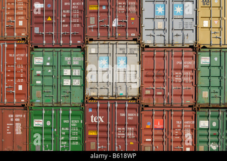 Various shipping containers, stacked Stock Photo - Alamy