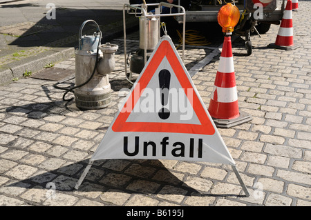 traffic cone to mark road works or temporary obstruction traffic sign ...