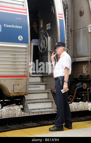 Amtrak railroad conductor communicating with train driver America USA ...