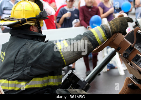 A fireman in the driver's seat of a fire truck in Columbus, Georgia ...