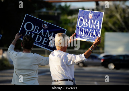 Supporters show signs for Barack Obama for President on busy road Stock ...