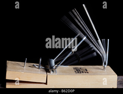 Mouse trap going off Stock Photo - Alamy